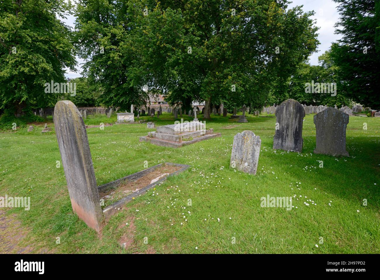 Gravestones in the graveyard at Crediton Parish Church, Crediton, Devon ...