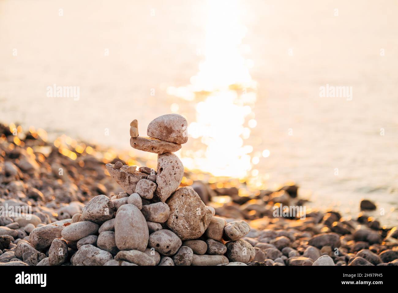 Pebbles balanced on top of each other High Resolution Stock Photography ...