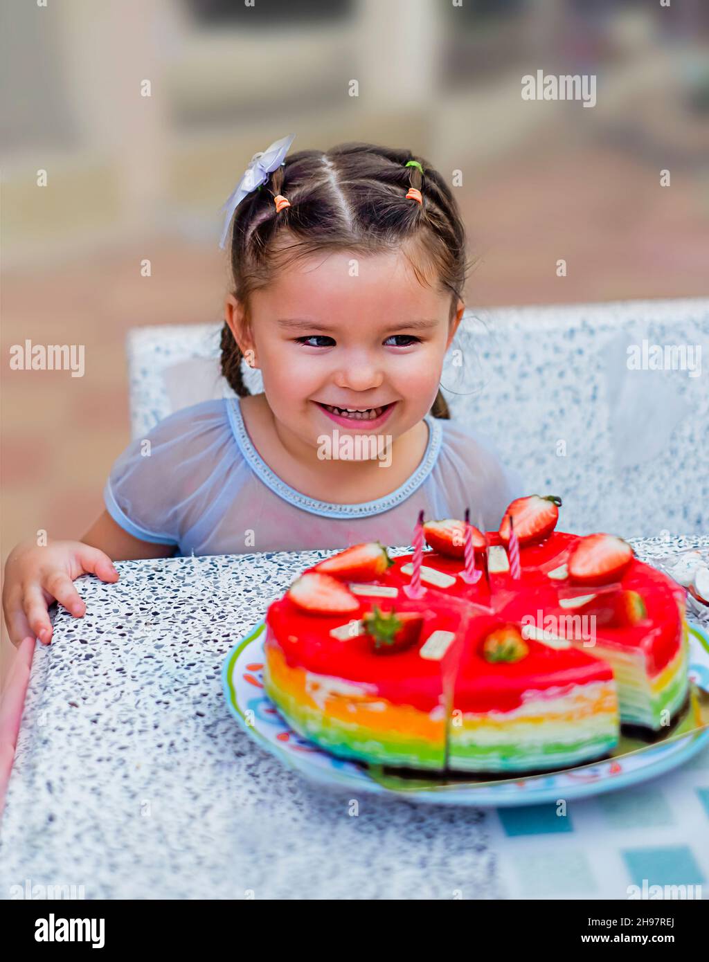 Child looking at birthday cake hi-res stock photography and images - Alamy
