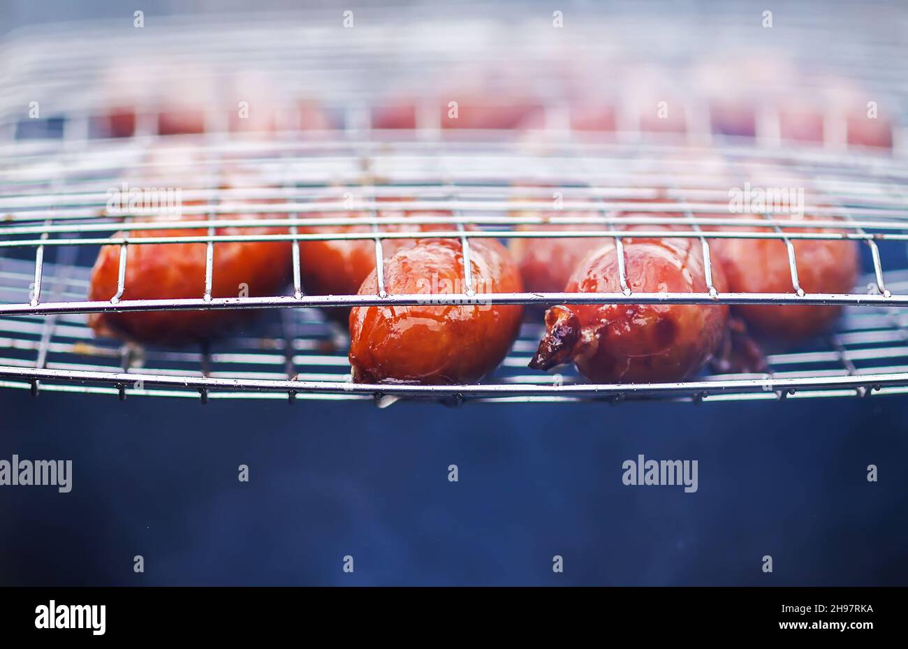 Frying sausages on hot coals hi-res stock photography and images - Alamy