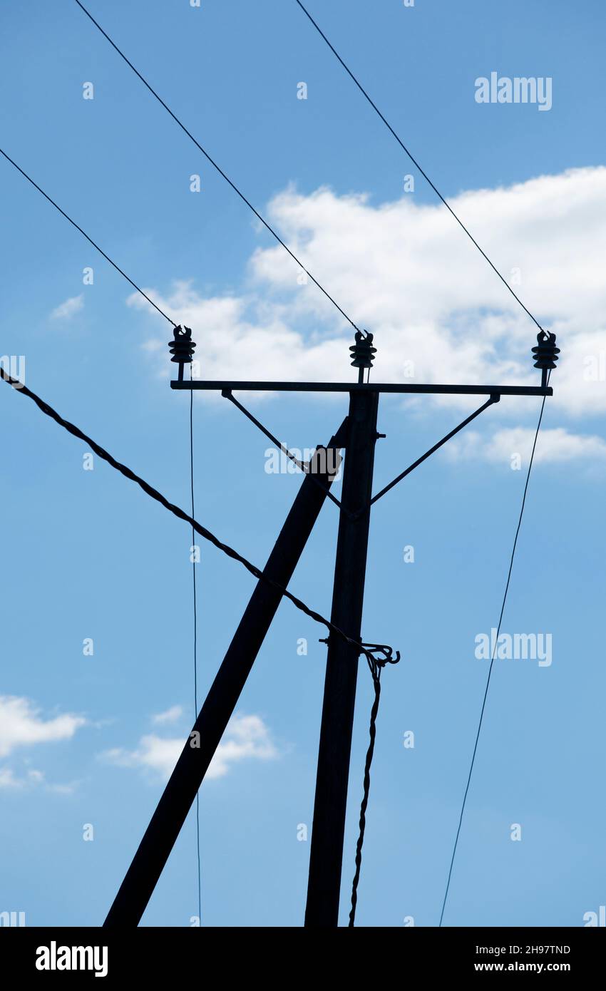 Wooden utility pole and power lines Stock Photo - Alamy