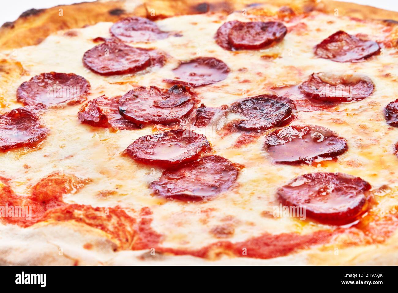 Single pepperoni italian pizza isolated over white background Stock ...