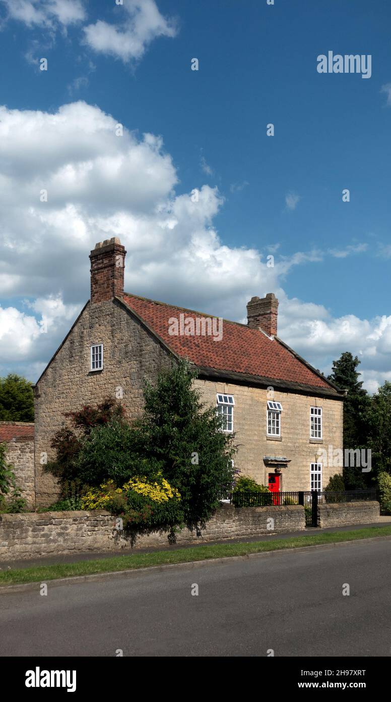 Pretty stone detached large cottage hi-res stock photography and images ...