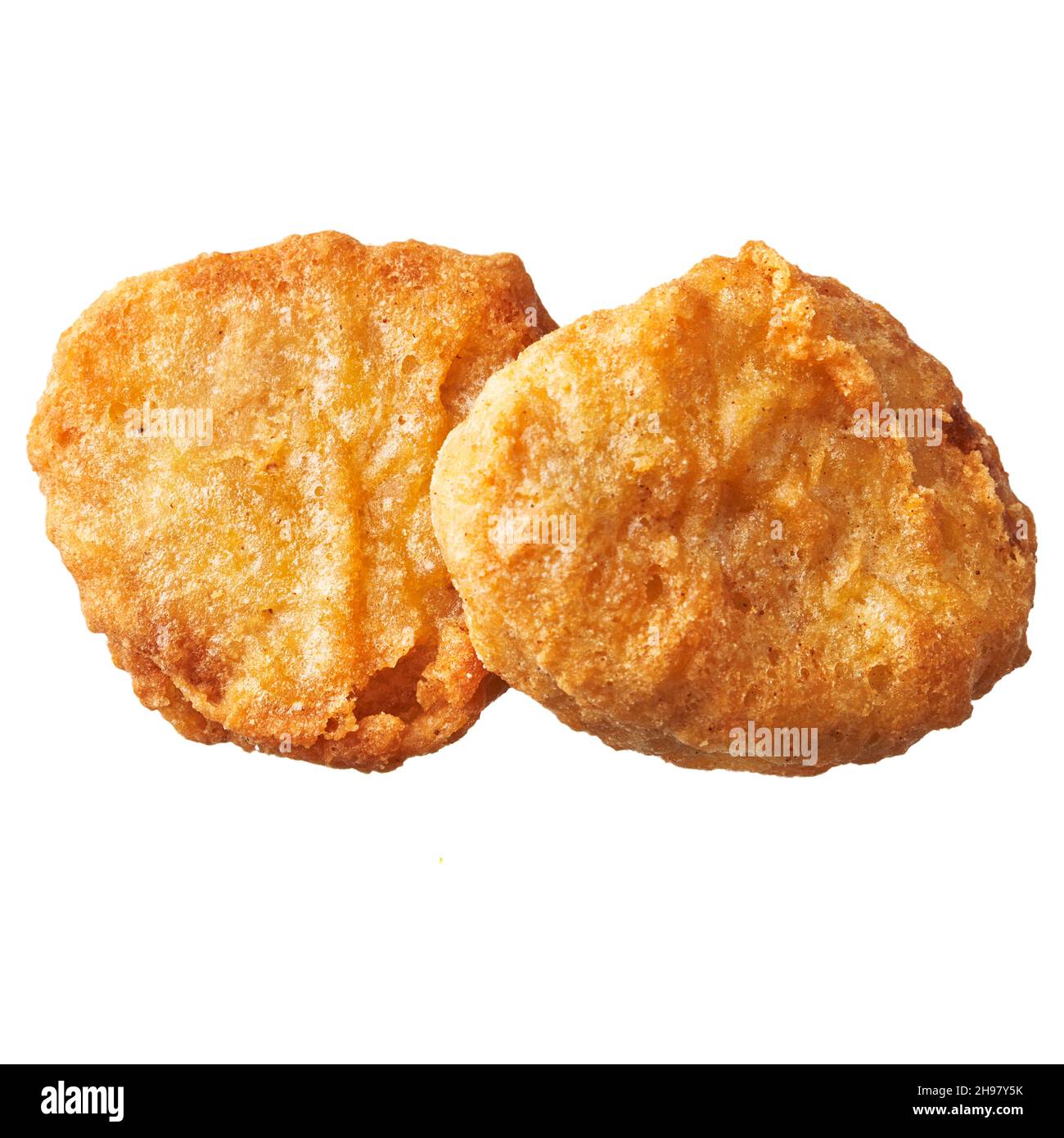 Two chicken nuggets isolated on a white background Stock Photo - Alamy