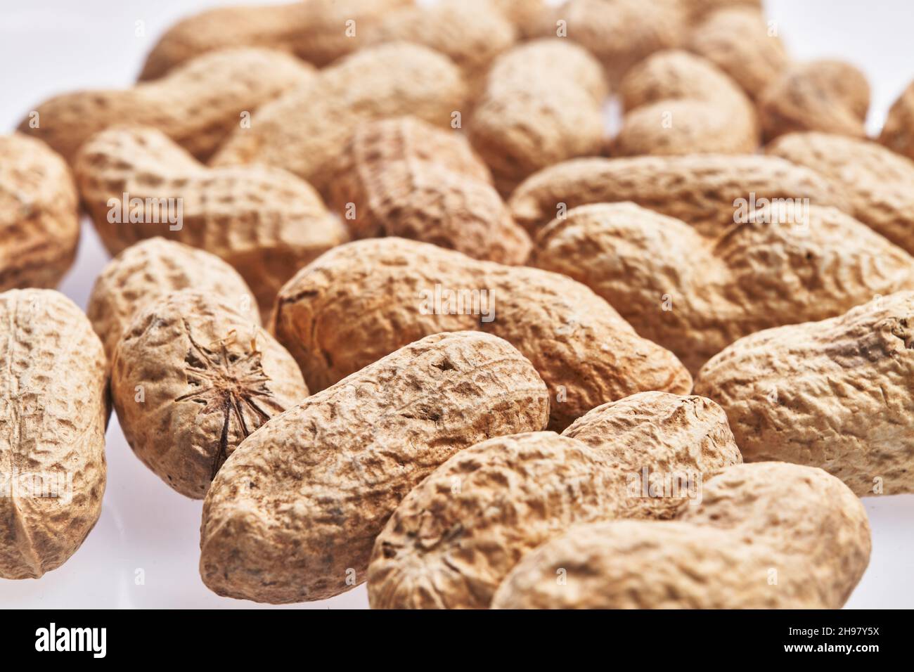Bunch of peanuts with shell isolated on a white background Stock Photo ...