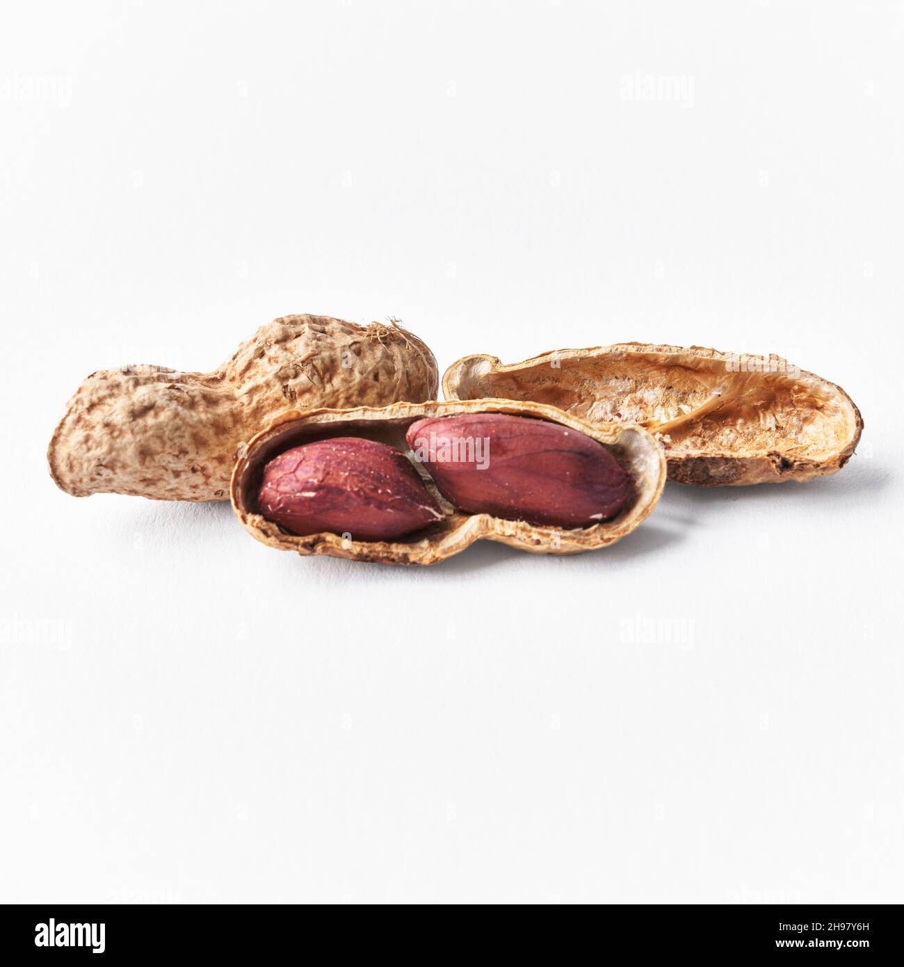 Bunch of peanuts isolated on a white background Stock Photo - Alamy