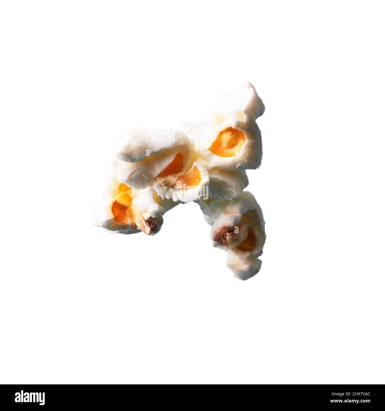 Single delicious salty popcorn isolated on a white background Stock ...