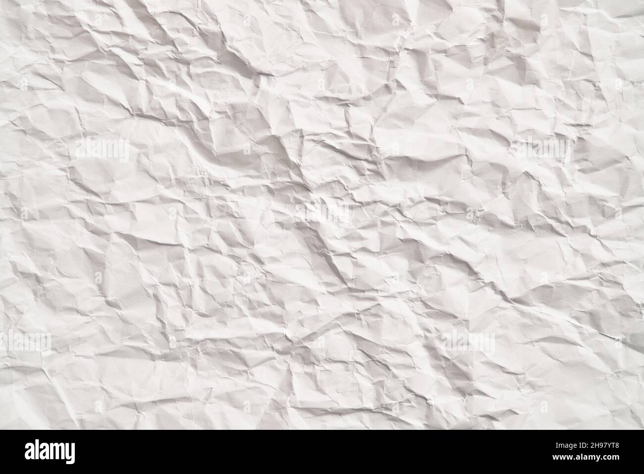 White crumpled paper texture with wrinkles. Damaged and torn sheet ...