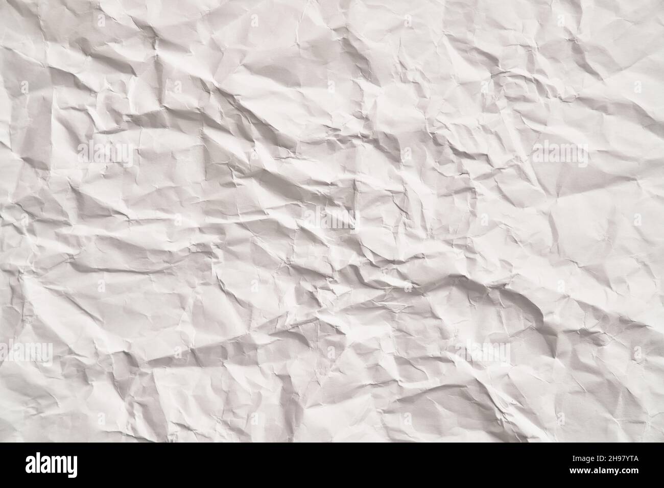 White crumpled paper texture with wrinkles. Damaged and torn sheet ...