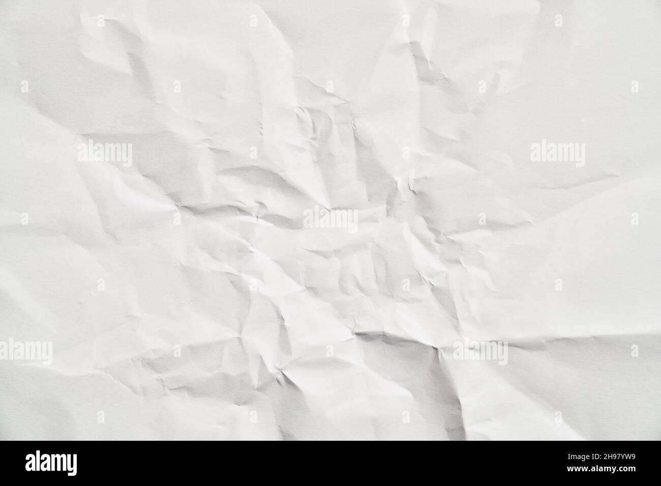 White crumpled paper texture with wrinkles. Damaged and torn sheet ...