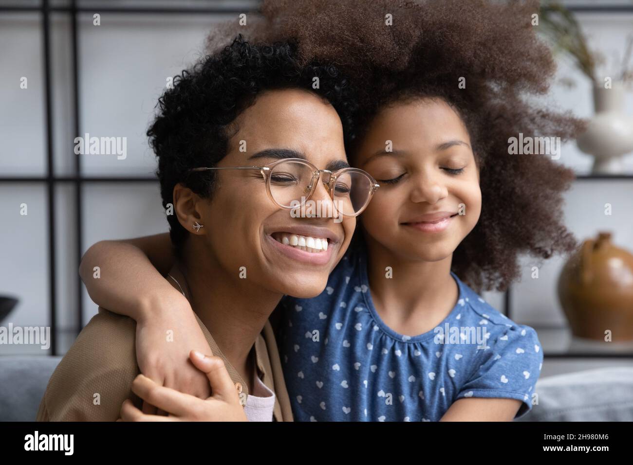 Head shot African American family showing tender emotions Stock Photo ...