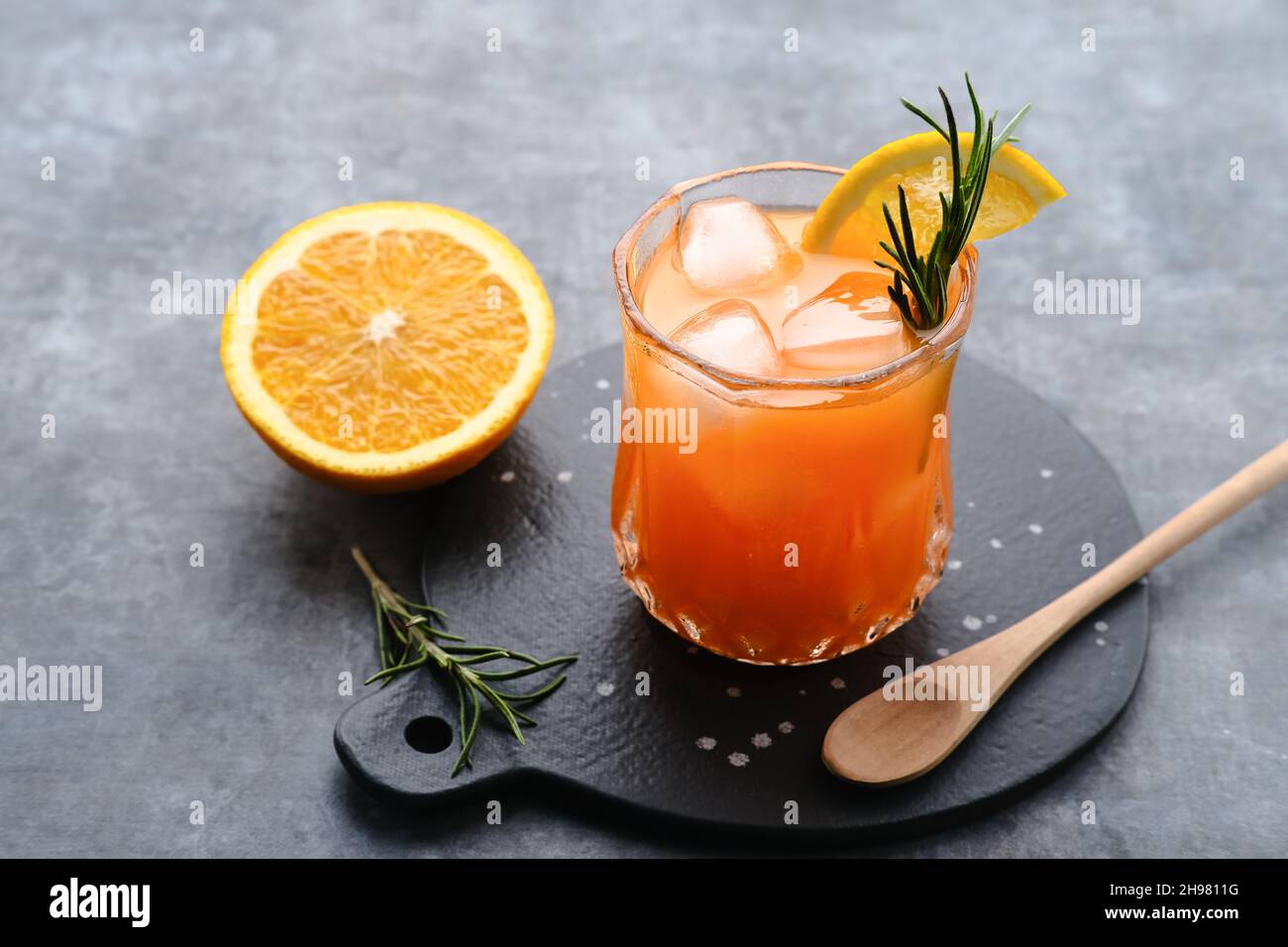Orange juice in glass, cold pressed juice Stock Photo - Alamy