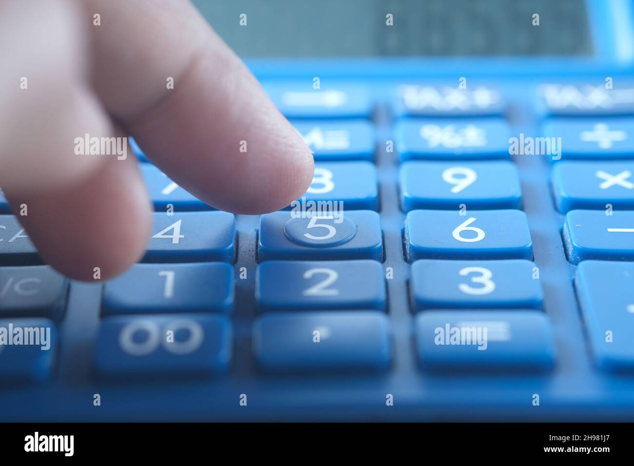 Man hand using calculator hi-res stock photography and images - Alamy