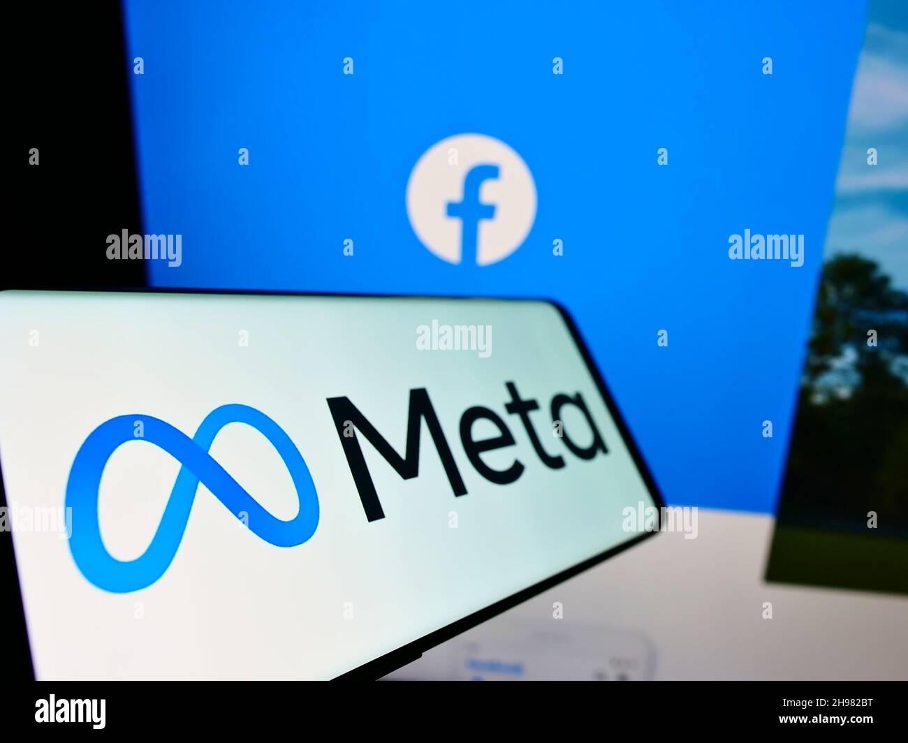 Smartphone with logo of US technology company Meta Platforms Inc. on ...