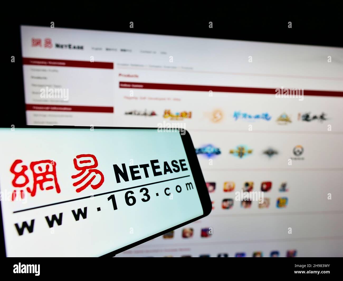 Mobile phone with logo of Chinese Internet technology company NetEase ...