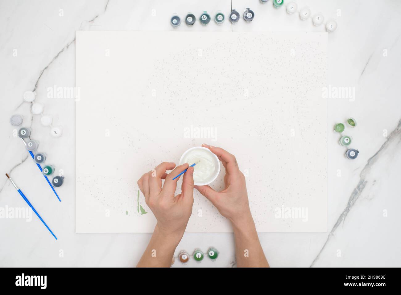 hobby at home painting by numbers to draw from above a view of women's ...