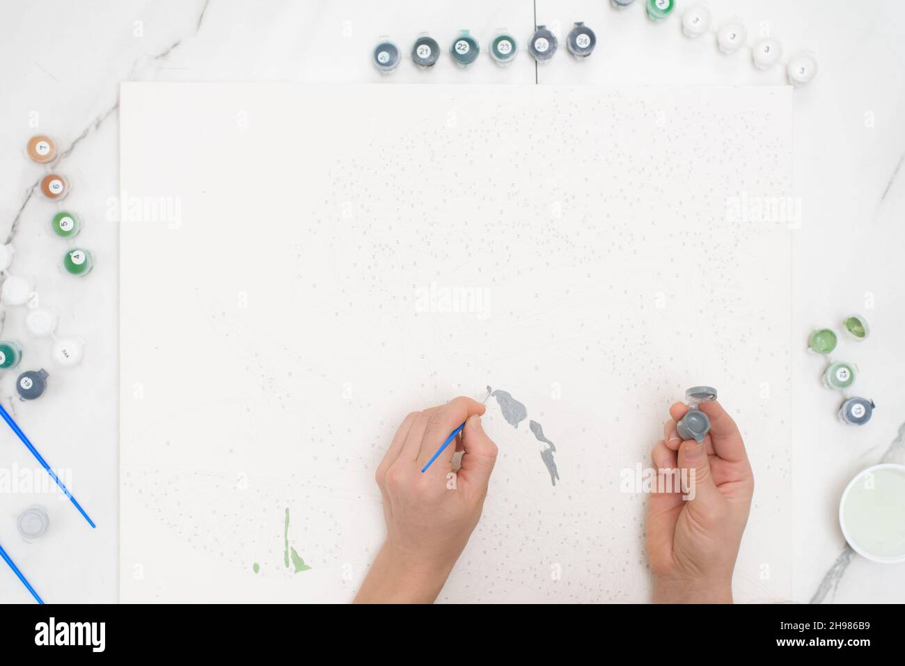 hobby at home painting by numbers to draw from above a view of women's ...