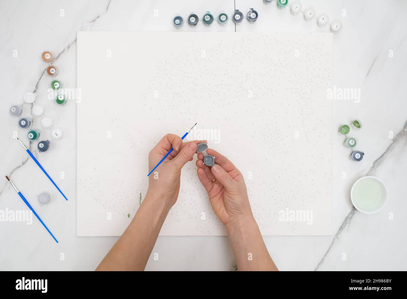 hobby at home painting by numbers to draw from above a view of women's ...