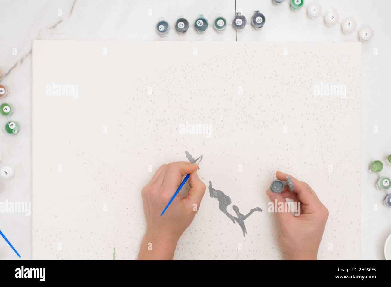 hobby at home painting by numbers to draw from above a view of women's ...