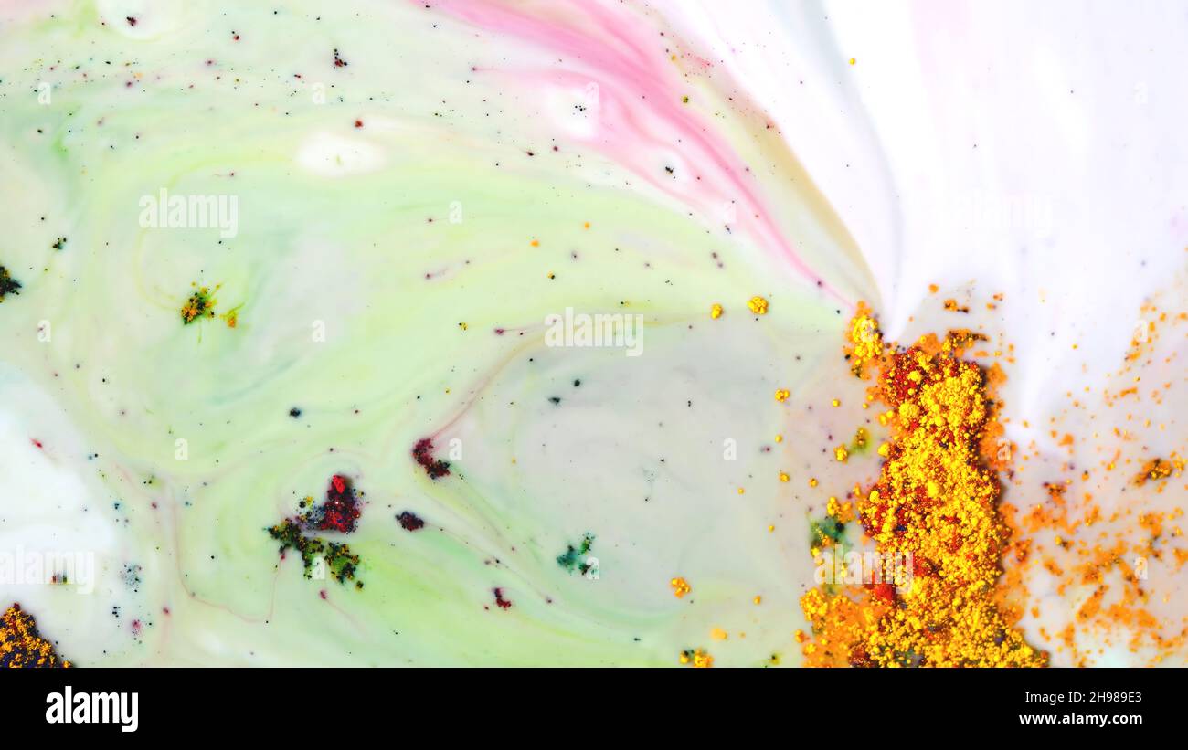 Close-up of colorful powder paint on water. Abstract art drawing of ...