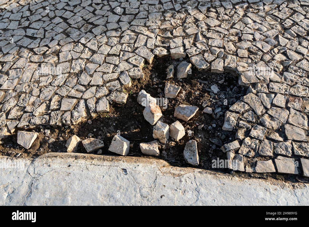 Texture of checkered stones in geometric shape on the ground. Museum of ...