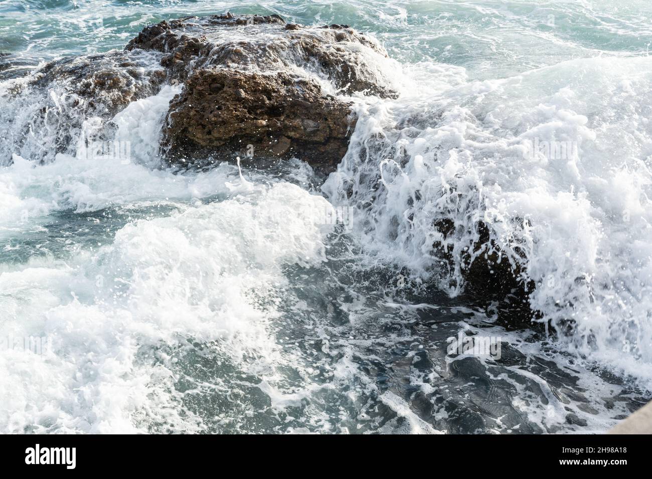 Blue sky surf waves coastline round rocks hi-res stock photography and ...