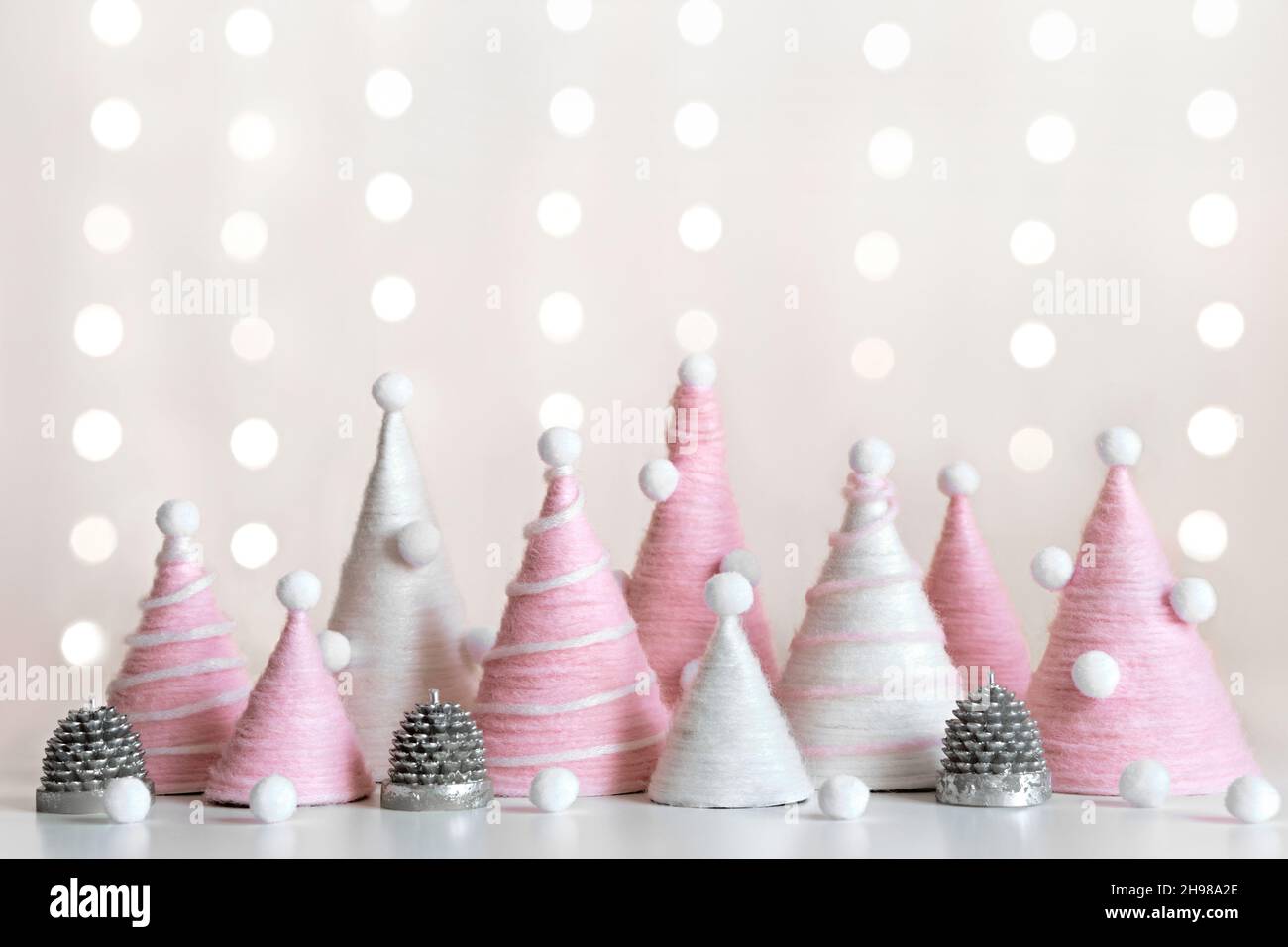 Diy Christmas trees is made of pink yarn. Eco-friendly fluffy Christmas ...
