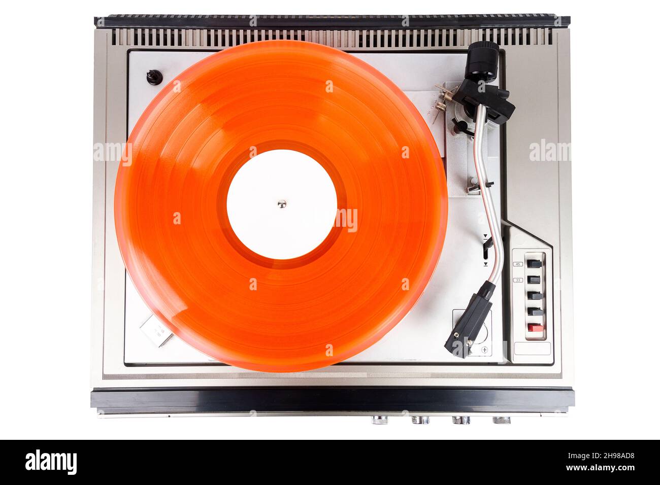 Vintage turntable record player with red vinyl isolated on white ...