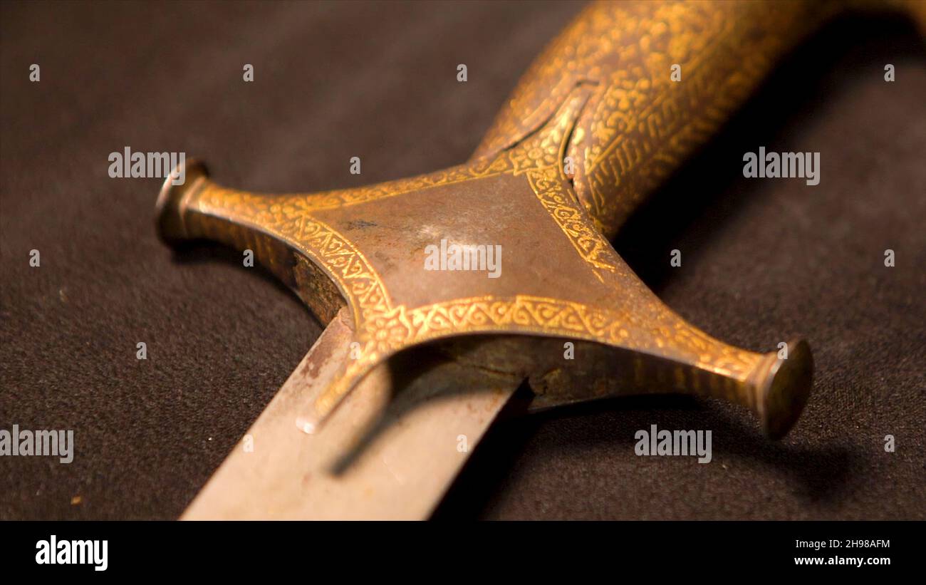 Close-up of patterns of handle of medieval weapon. Stock footage ...