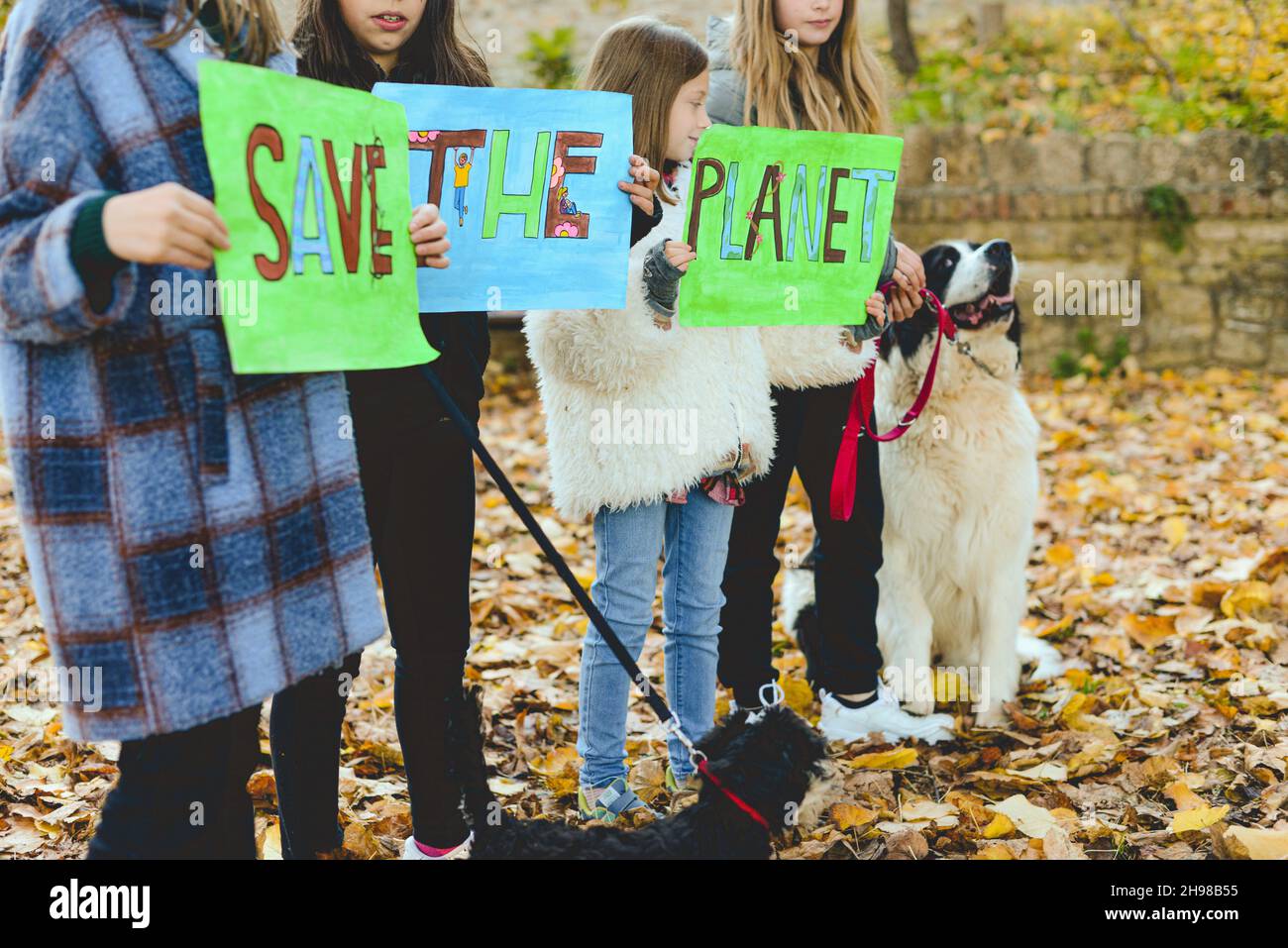 children playing to save the planet as evil toxic pollutes the earth ...