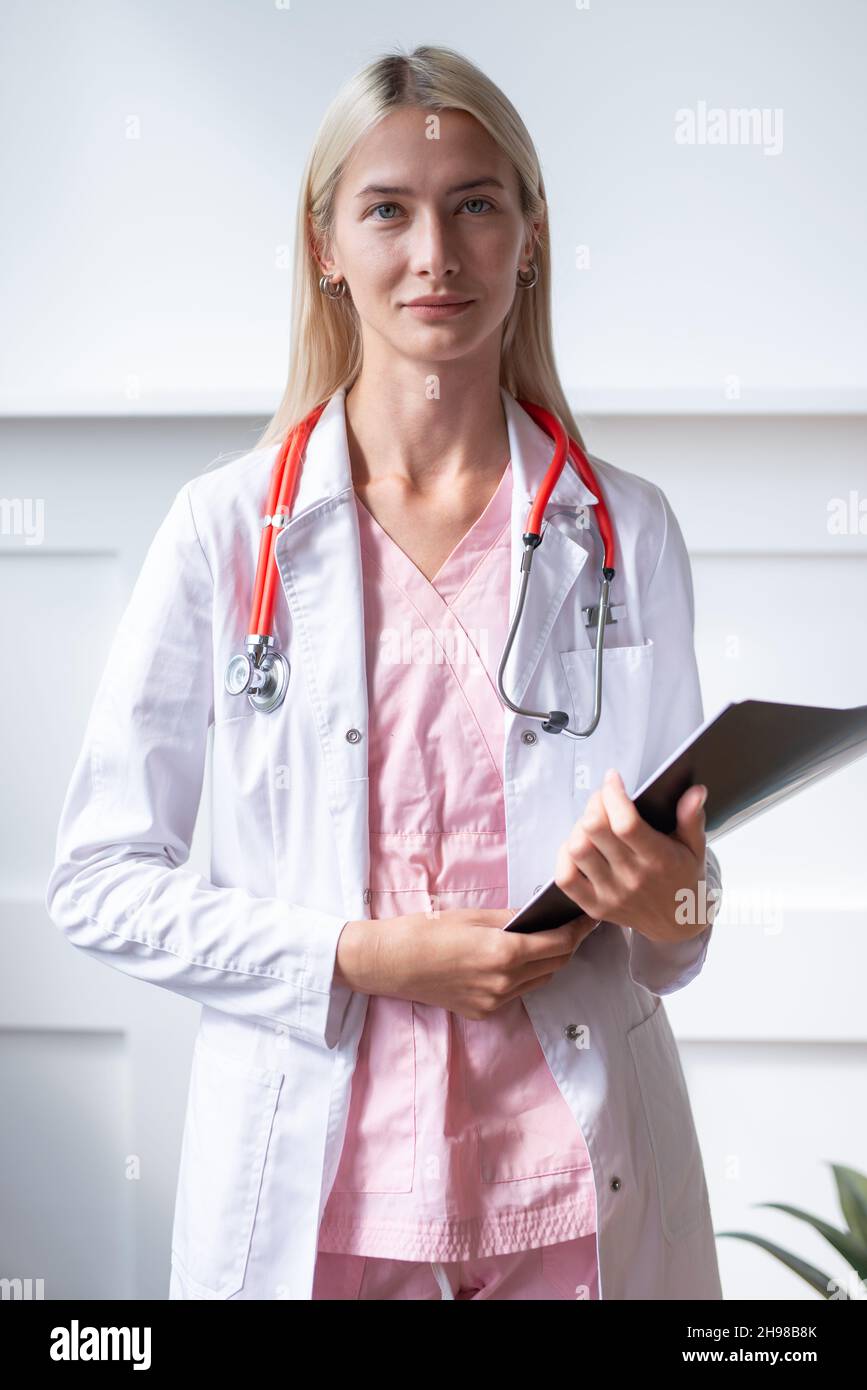 Portrait of young female doctor caucasian woman working in hospital ...