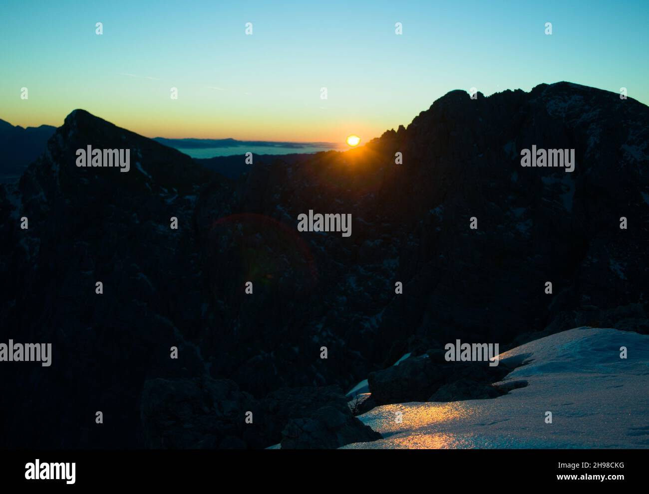 Sunrise up high in mountains background Stock Photo - Alamy