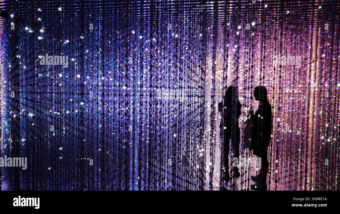 shadows of people in led illumination Stock Photo - Alamy