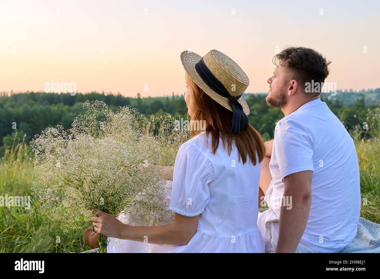 Beautiful romantic adult couple looking at the horizon, nature copy ...