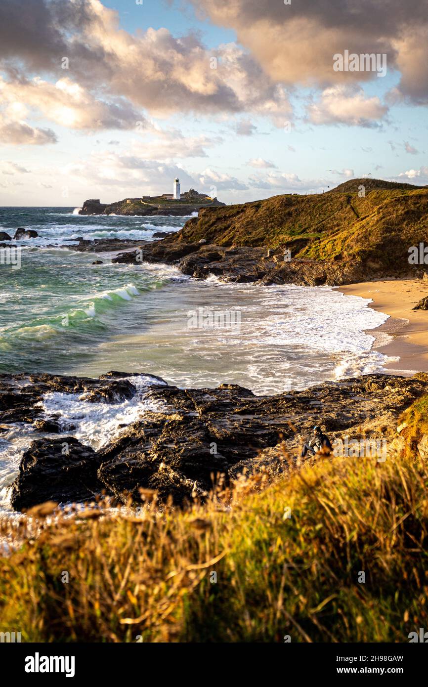 Godrevy Lighthouse, St Ives Bay, Cornwall, in the golden evening light ...