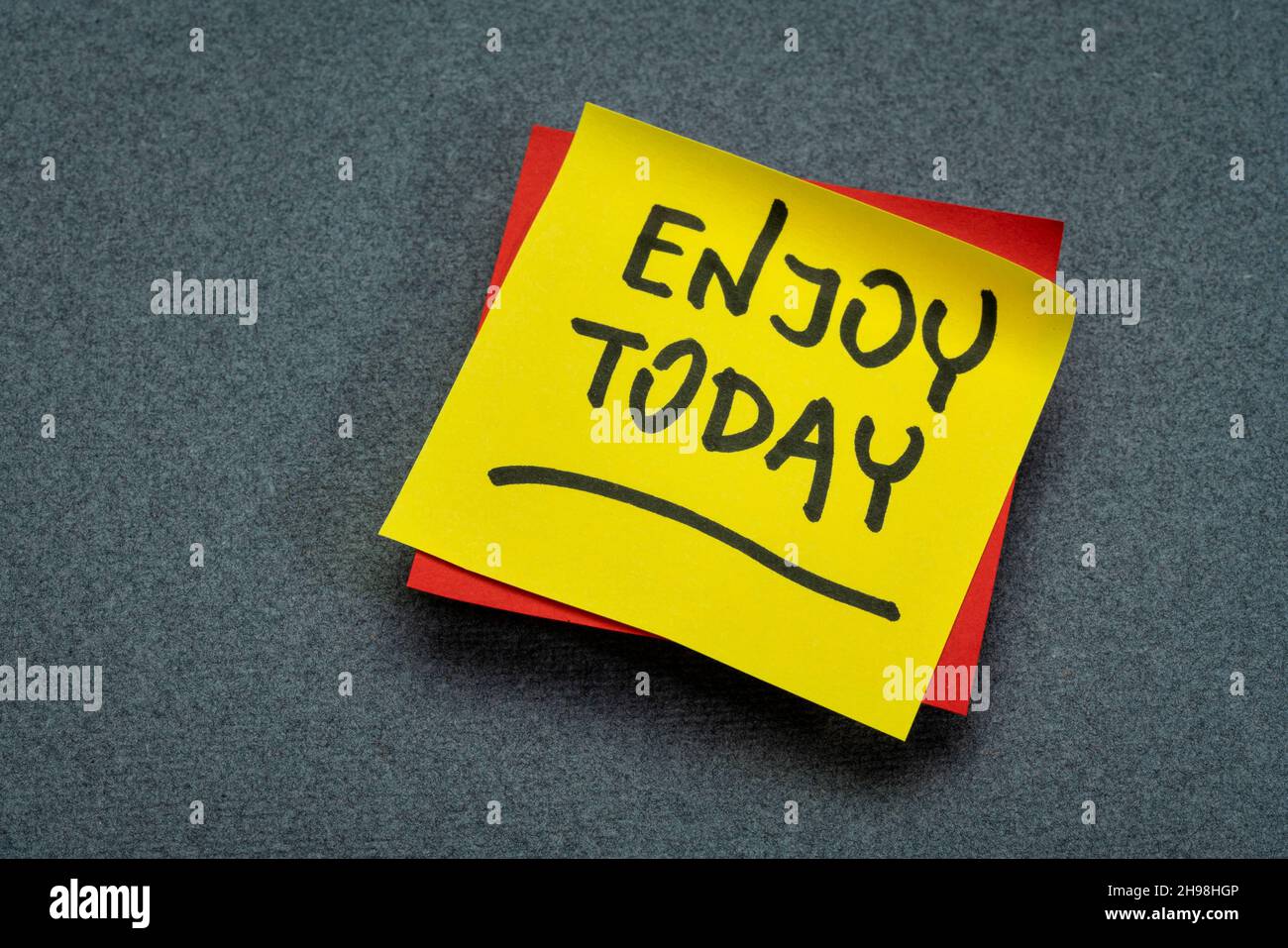 Enjoy today reminder - handwriting on a sticky note, positive attitude ...