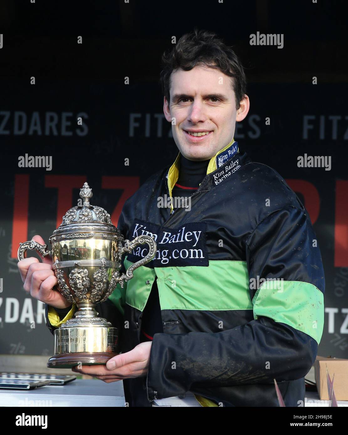 David Bass celebrates with the trophy for The Fitzdares Peterborough ...
