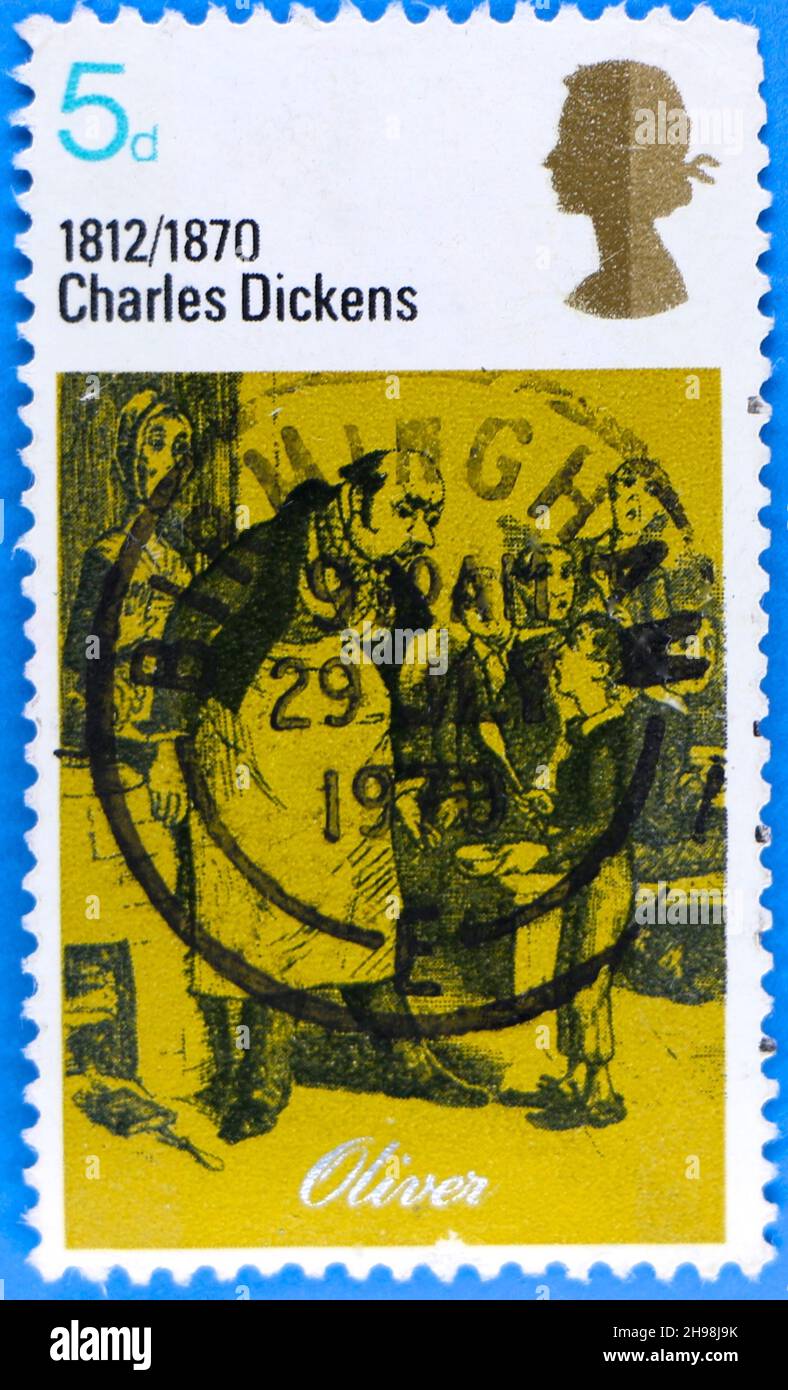 Photo of a 5d postage stamp from Great Britain in the Dickens ...