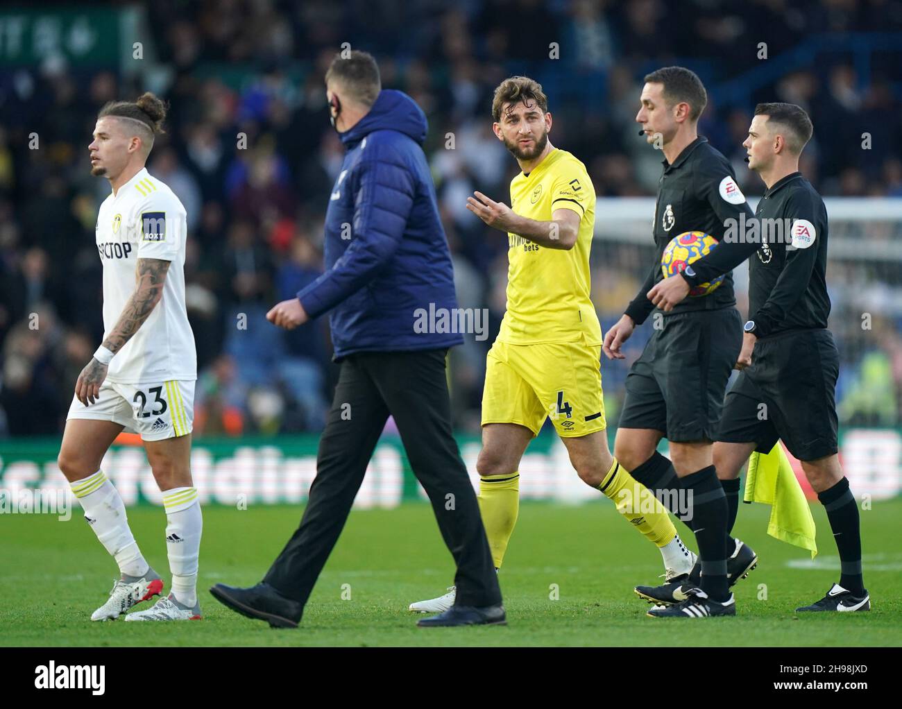 Brentford's Charlie Goode (centre) appeals to referee David Coote at ...