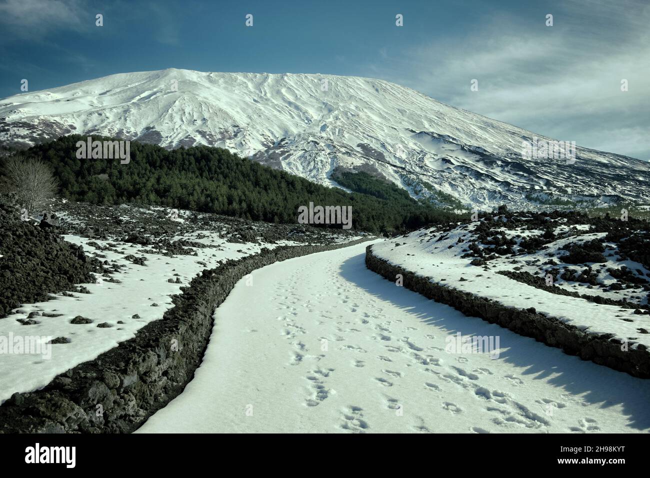 winter landscape of mountain in Sicily road and slope of Etna Mount ...