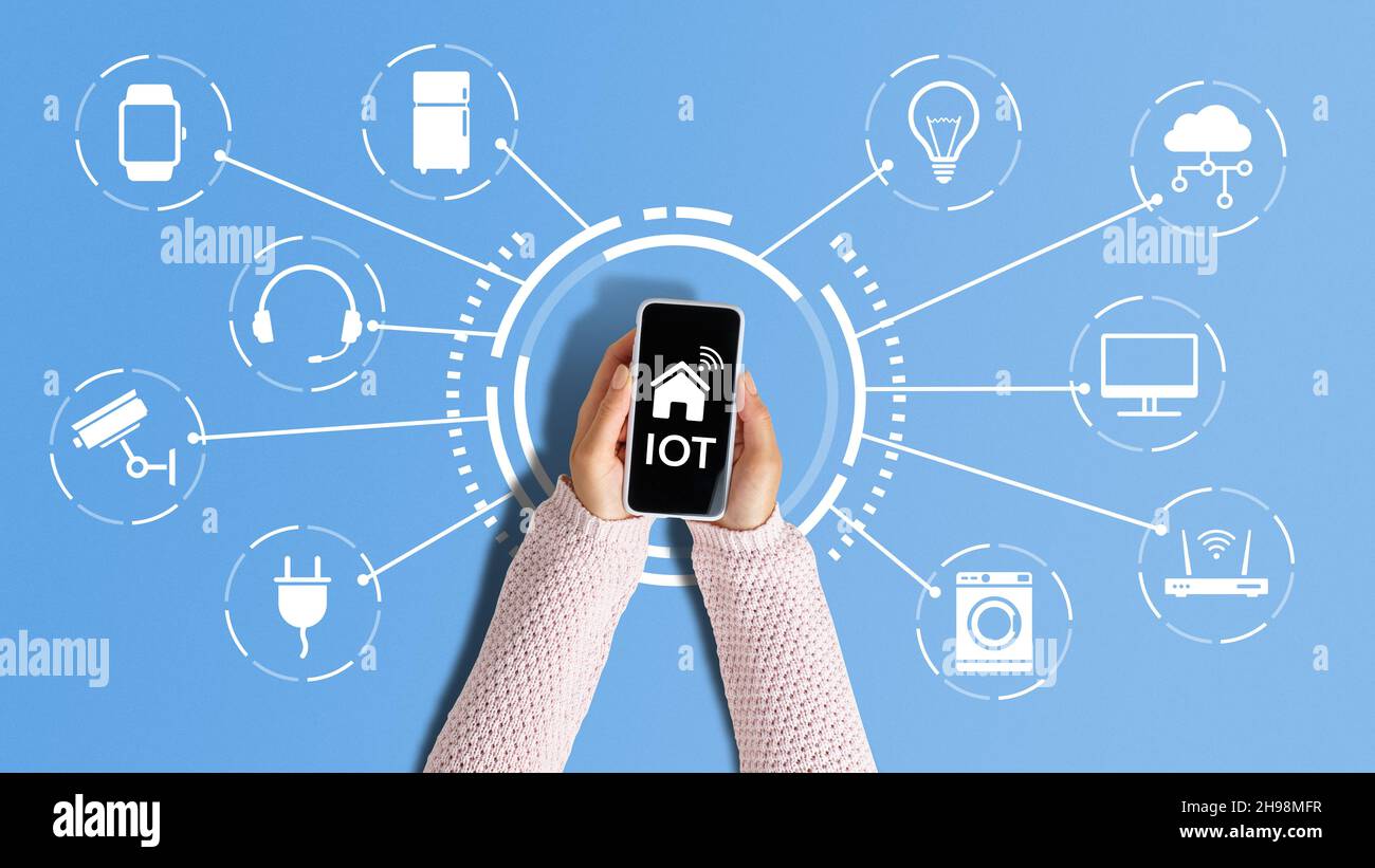 Iot or Internet of things concept. person controls equipment and ...