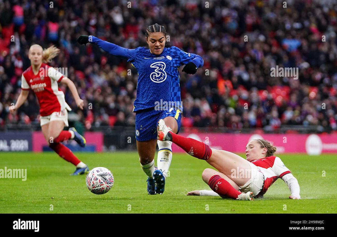 Chelsea's Jessica Carter (left) and Arsenal's Kim Little battle for the ...