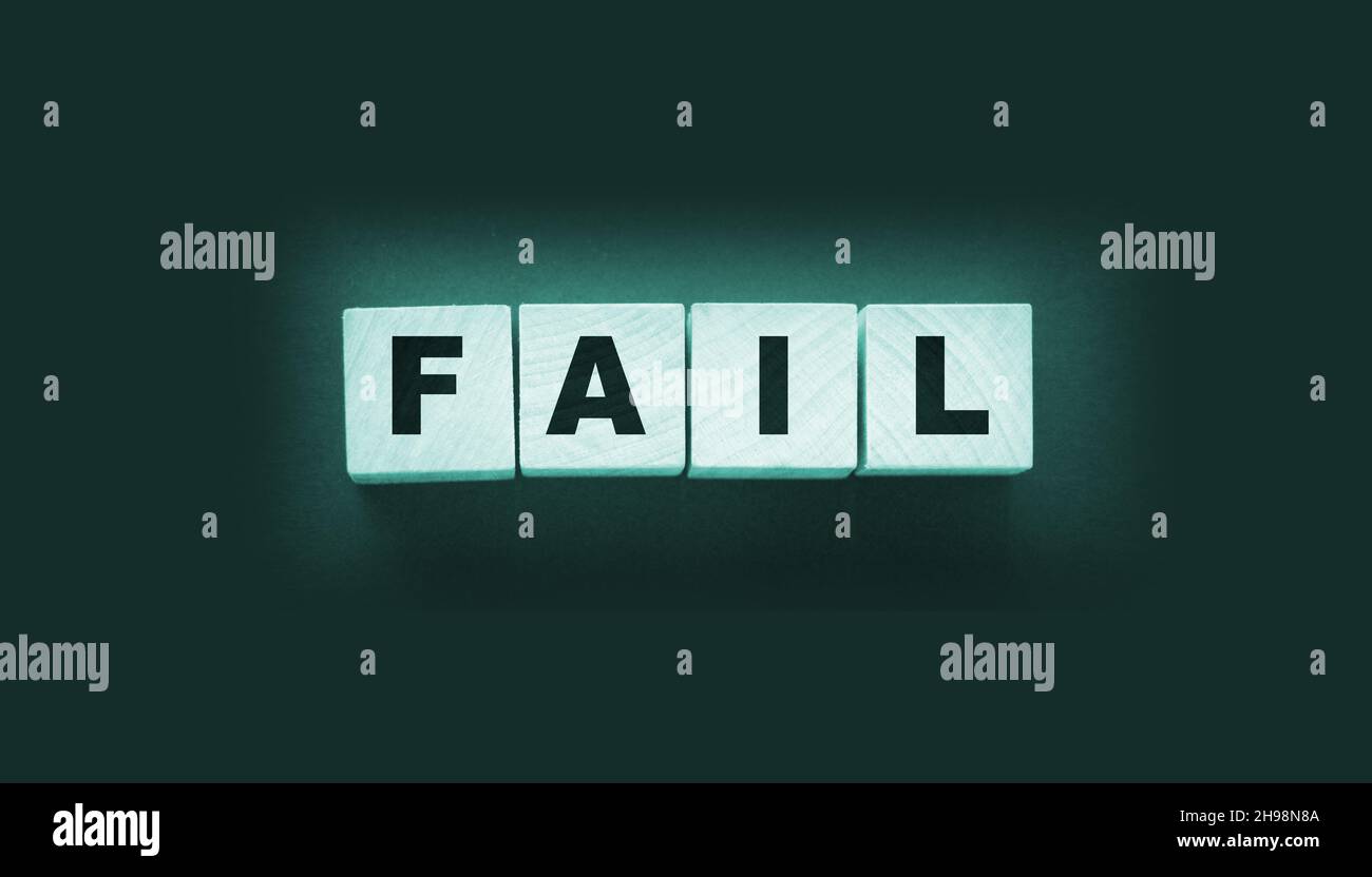 FAIL Word text Written In Wooden Cube blocks on black background ...