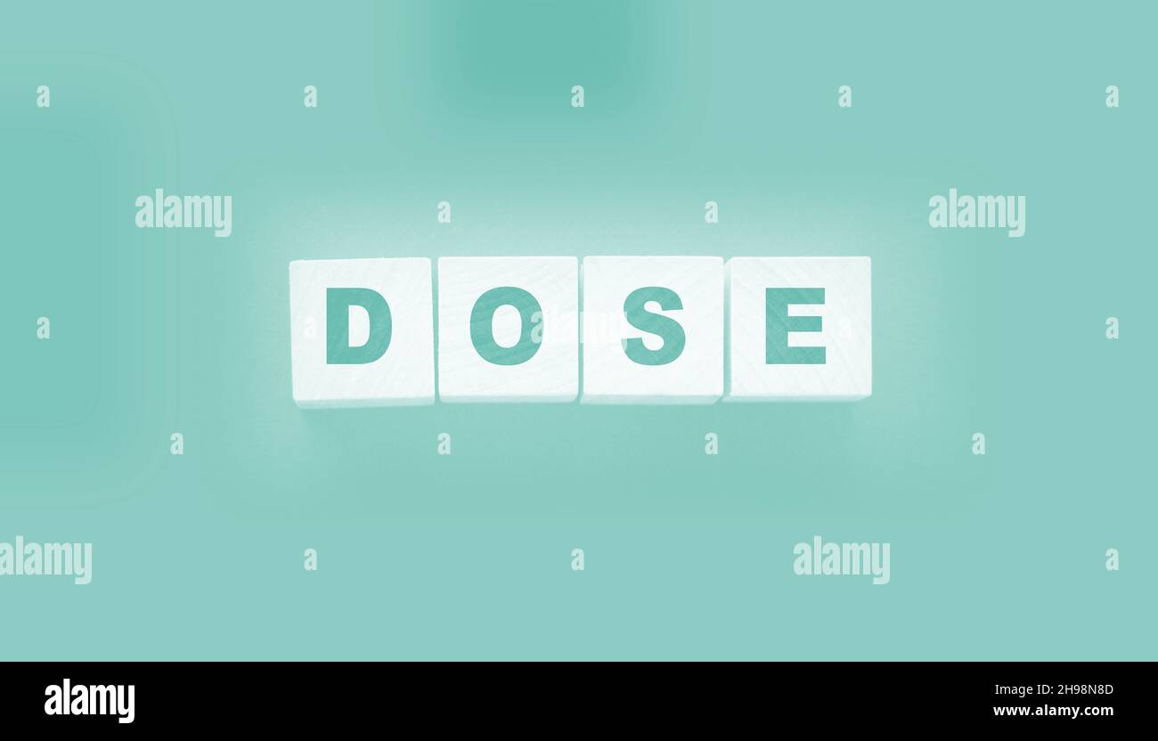 Wooden blocks with the word Dose. Medical concept Stock Photo - Alamy