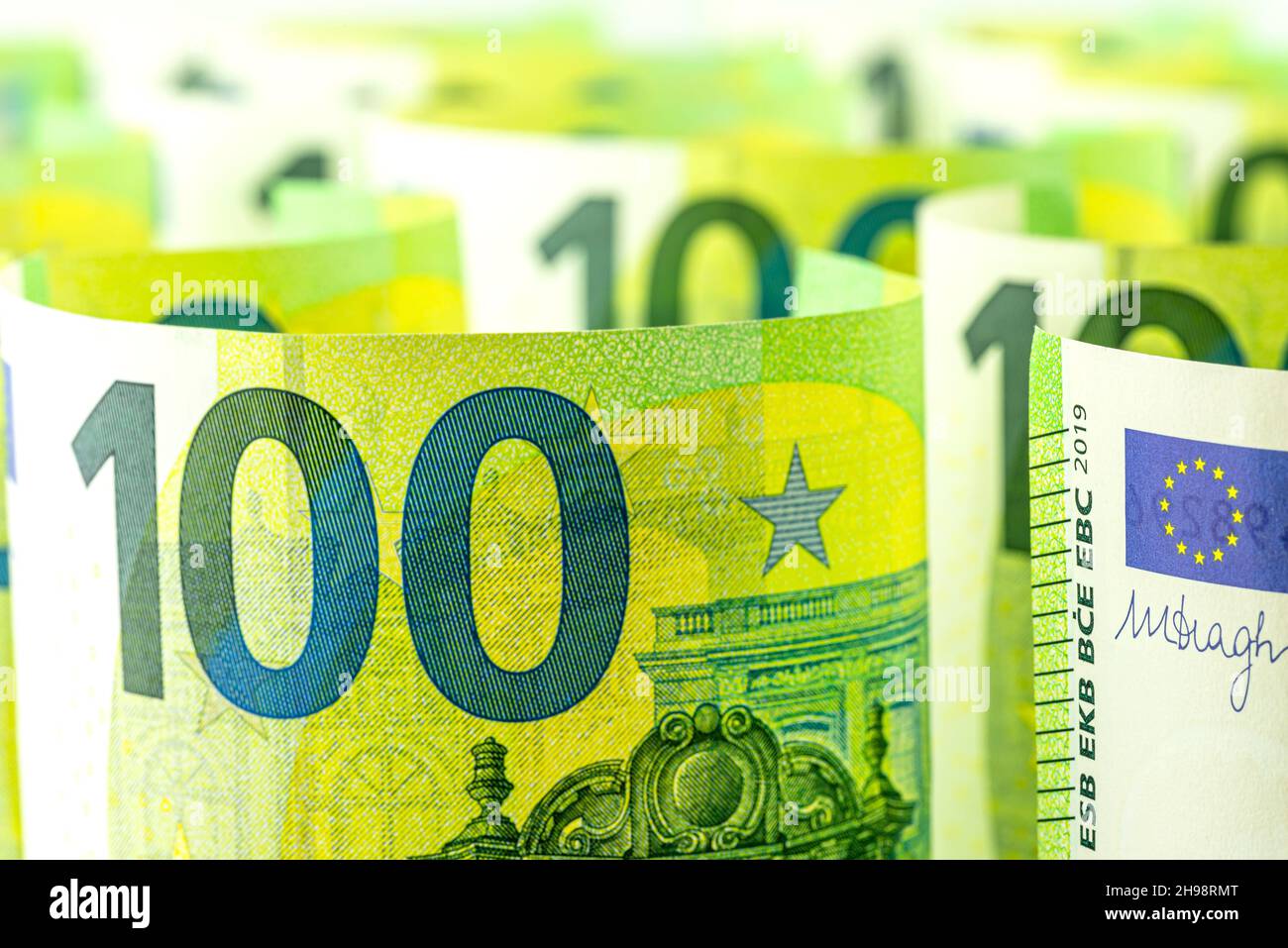 Macro photo of the European Union 100 EURO banknote, banknotes rolled ...