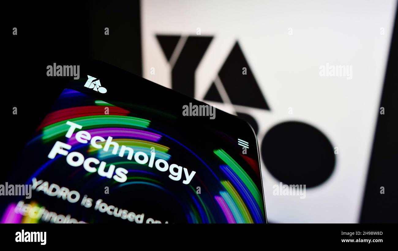 Mobile phone with webpage of Russian technology company YADRO on screen ...