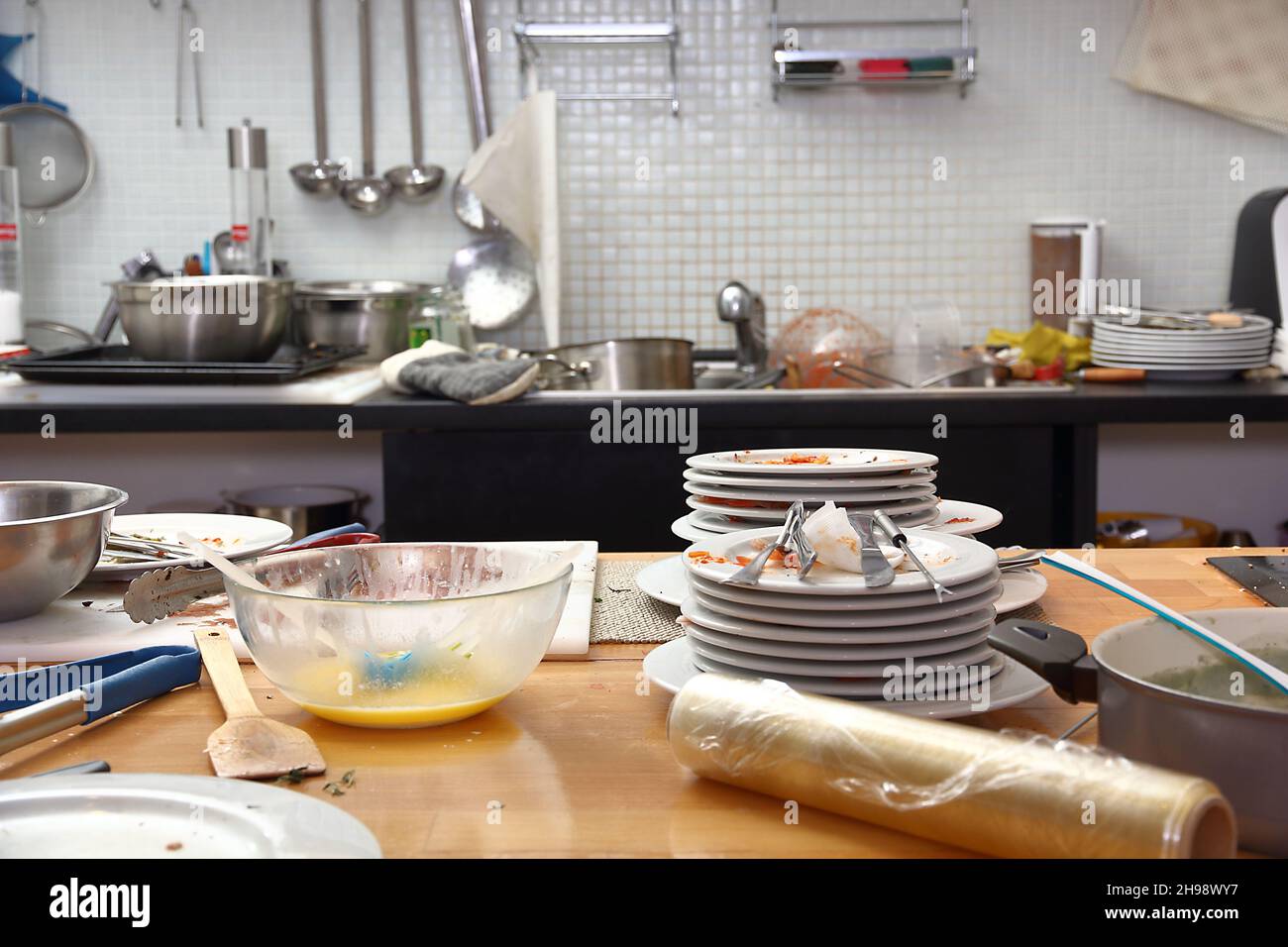 Heap of dirty utensil in the kitchen Stock Photo - Alamy