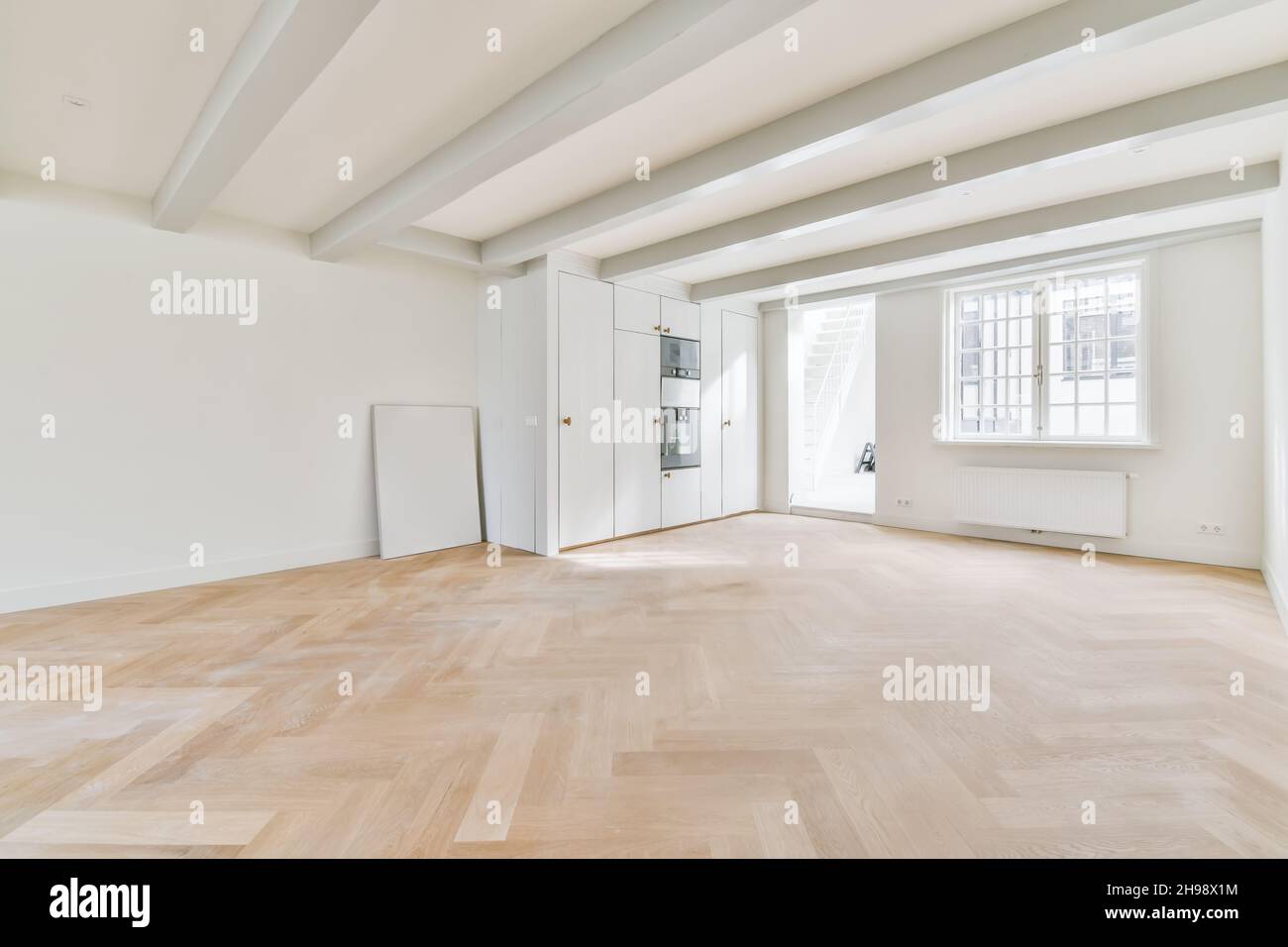 Magnificent huge bright room with large windows Stock Photo - Alamy