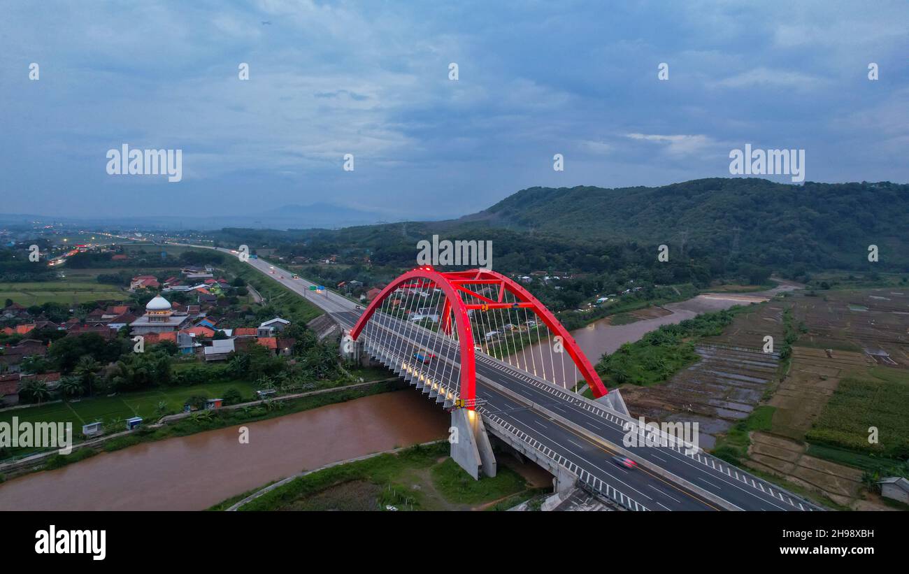 Aerial view of the Kalikuto Bridge, an Iconic Red Bridge at Trans Java ...