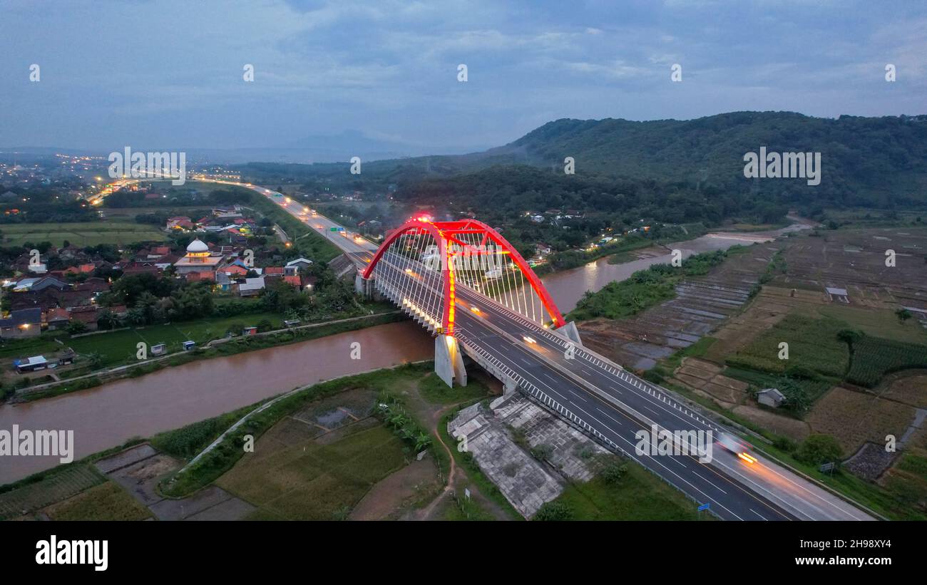 Aerial view of the Kalikuto Bridge, an Iconic Red Bridge at Trans Java ...